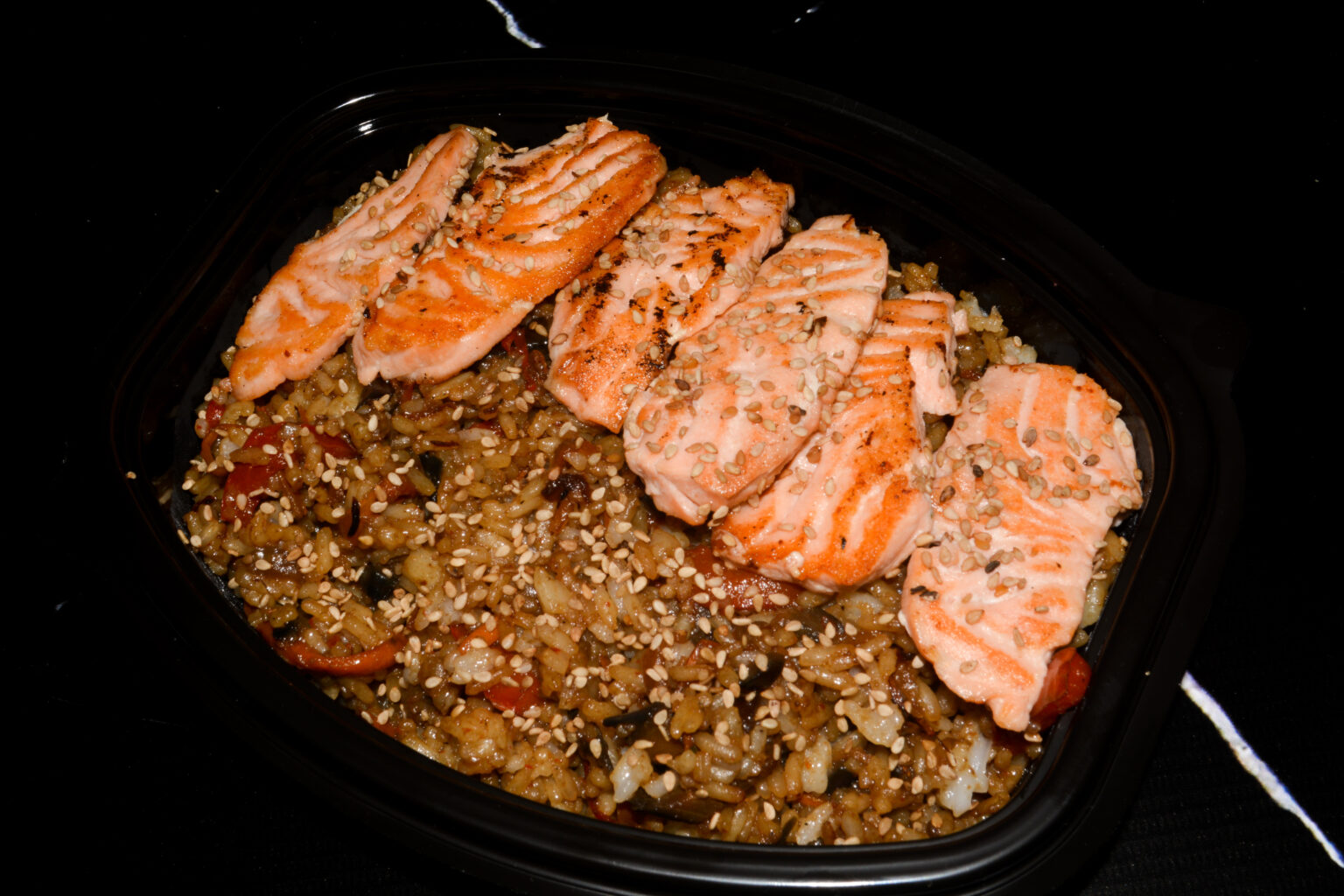 Wok de arroz y salmon – Sushi Sun